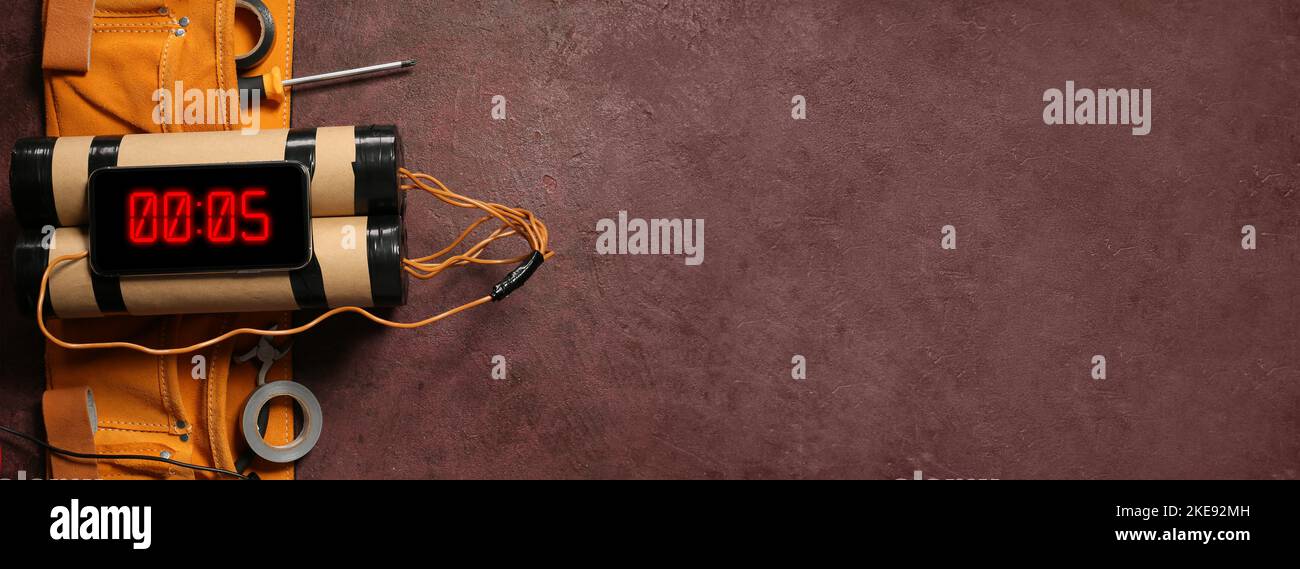Bomb and tools belt on color background with space for text Stock Photo ...