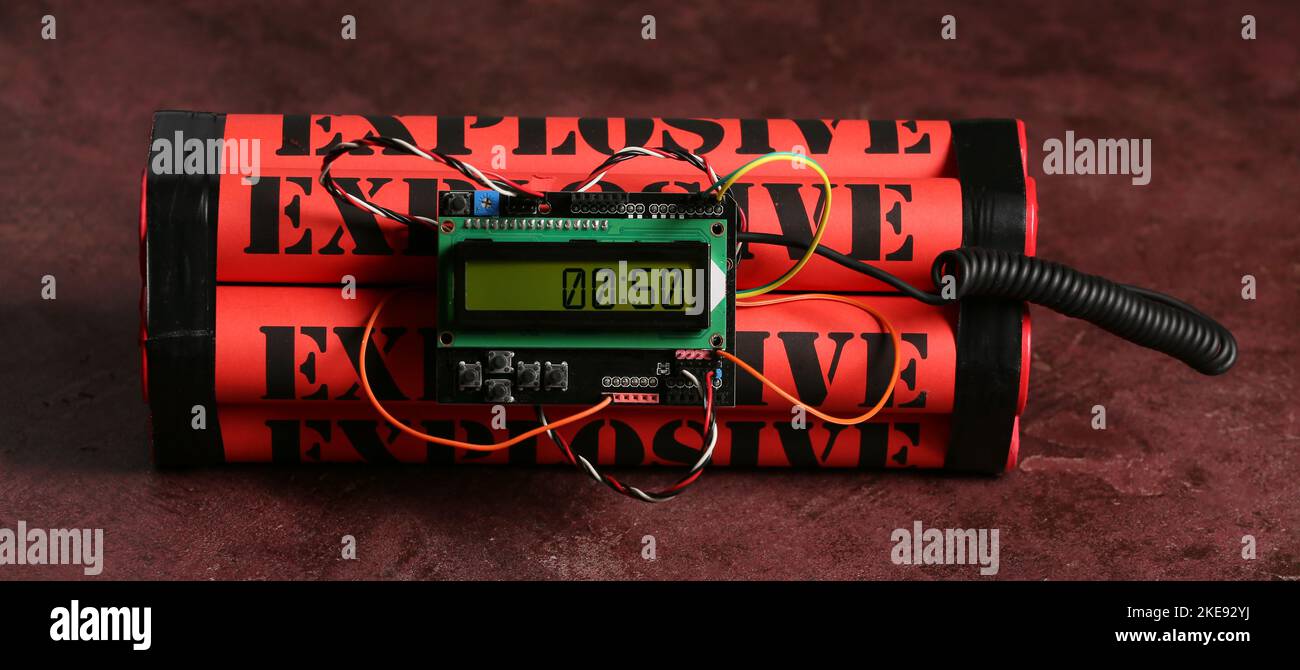 Bomb with timer on color background Stock Photo - Alamy