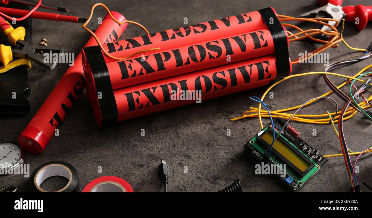 Parts for making bomb on table Stock Photo - Alamy
