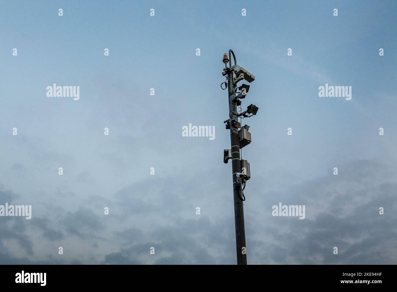 Large post with multiple cameras and listening devices, CCTV Stock ...
