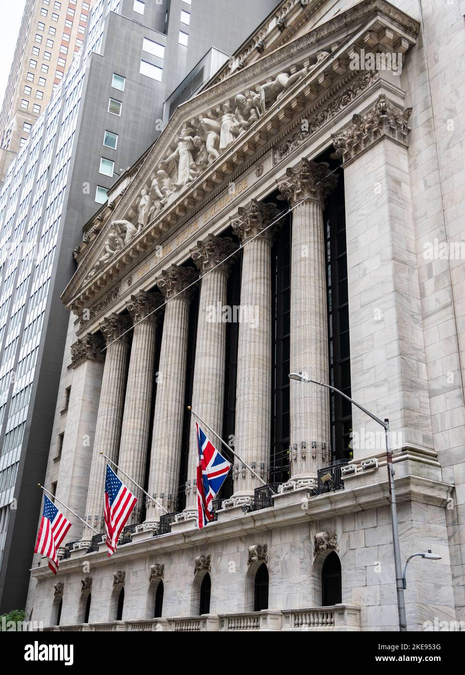 US national flags on the New York Stock Exchange building on Wall ...