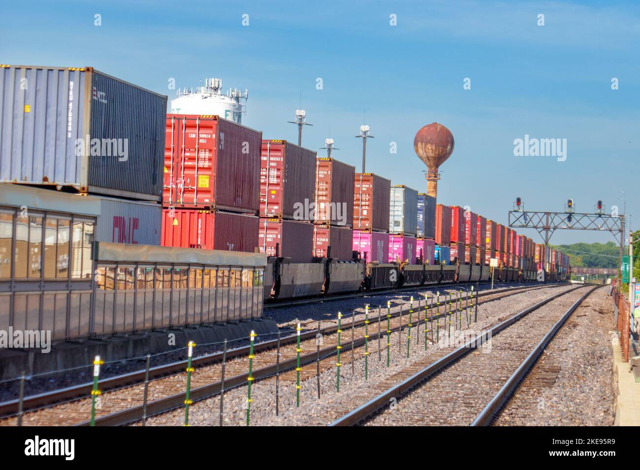 Parked train with a load of shipping containers Stock Photo - Alamy