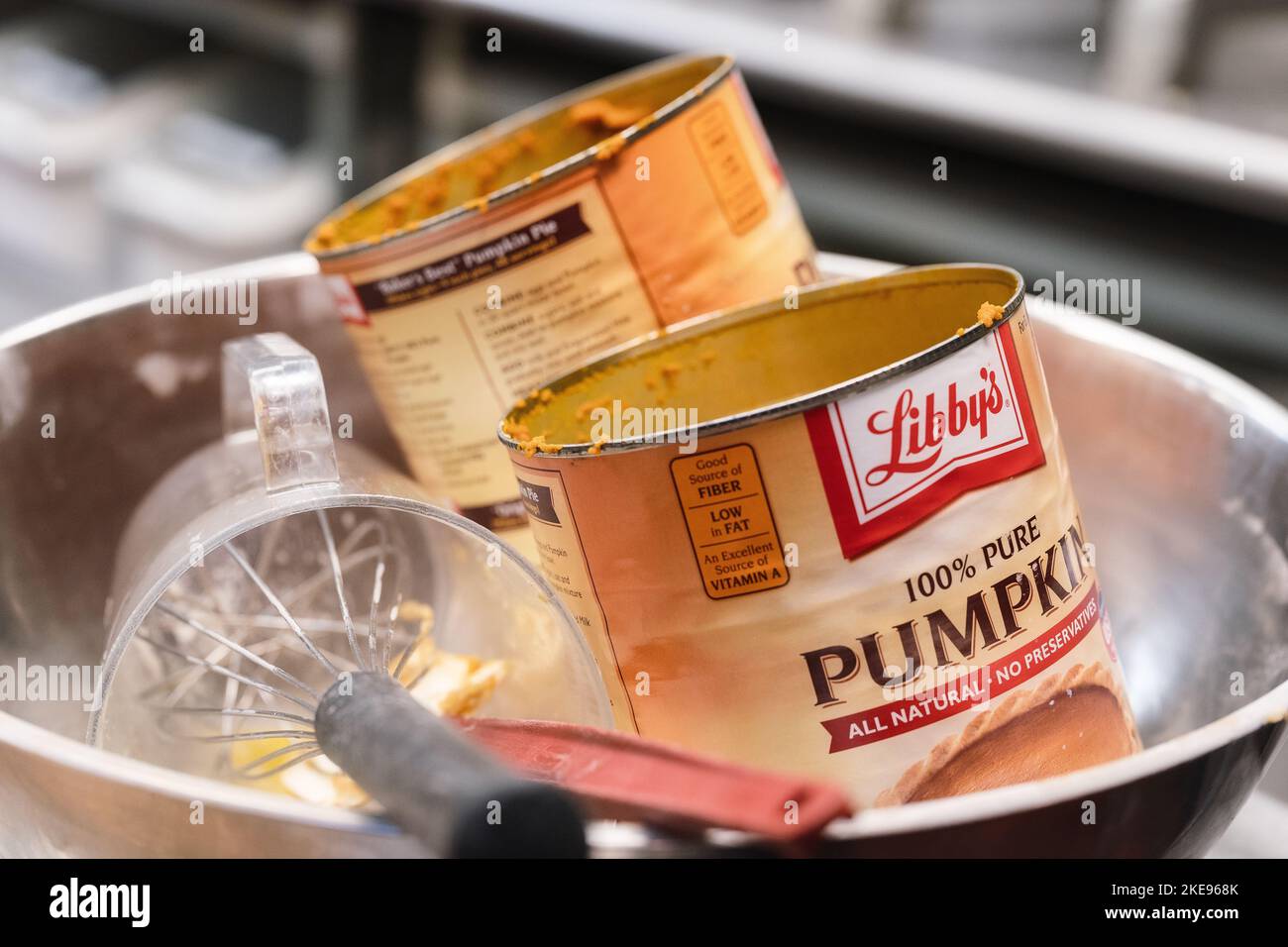 Empty pumpkin pie cans and dirty dishes after making a pumpkin pie ...