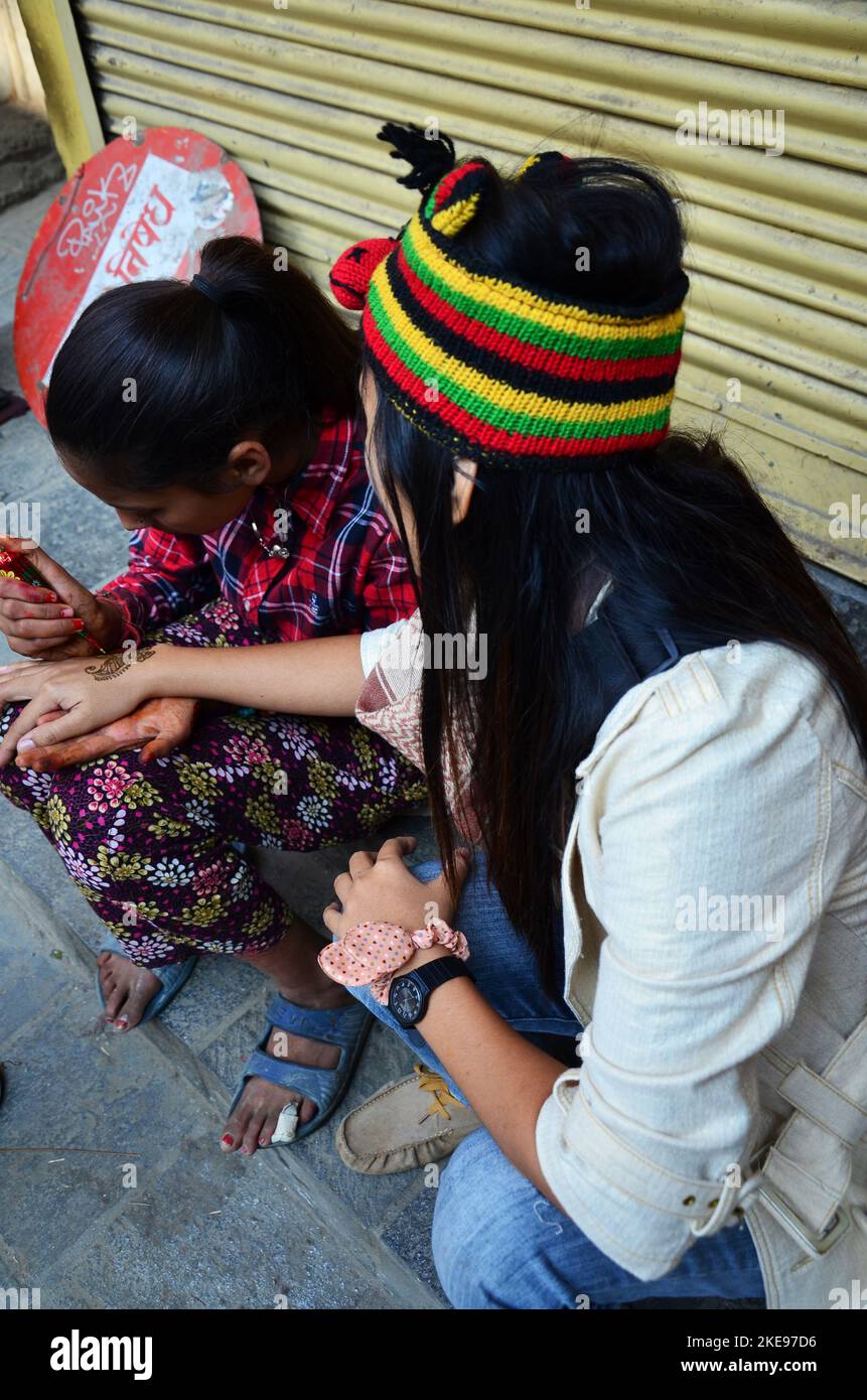 Nepali girl artist use henna ink write drawing paint mehndi henna ...