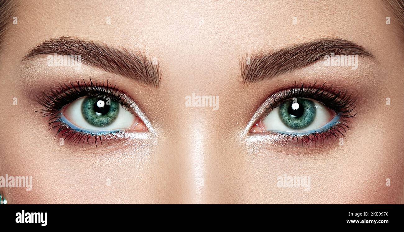 Beautiful female eyes with long eyelashes. Eyelash Extensions. Makeup ...