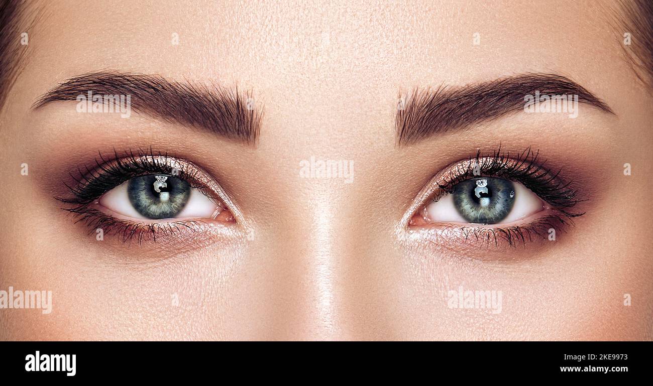 Beautiful female eyes with long eyelashes. Eyelash Extensions. Makeup ...