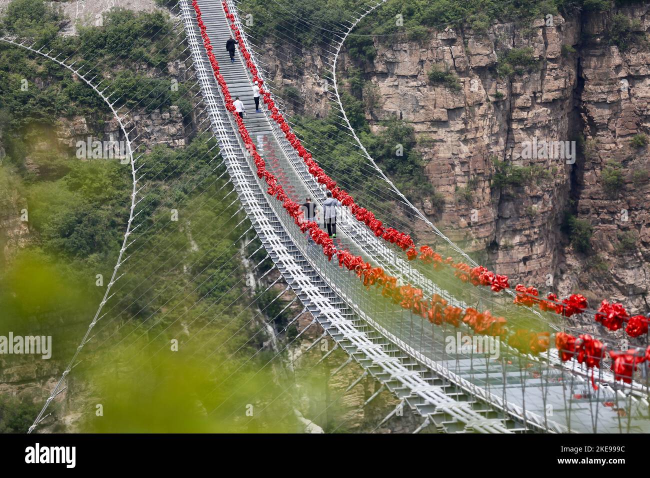 Aerial photos show the world's longest glass suspension bridge ...