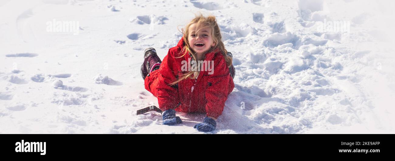 Winter banner. Cute girl playing in snow. Child in snow. Kid winter ...