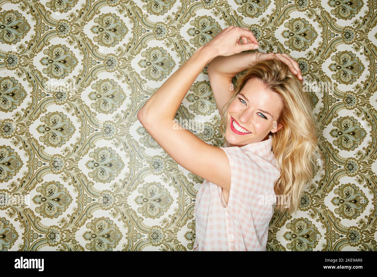 Pause for a minute and just enjoy. a young woman posing against a ...