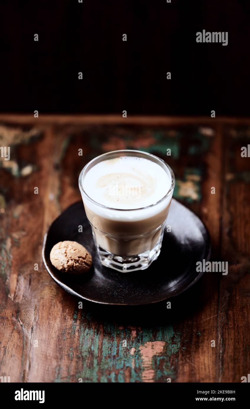 Coffee with milk on dark wooden background. Soft focus. Copy space ...