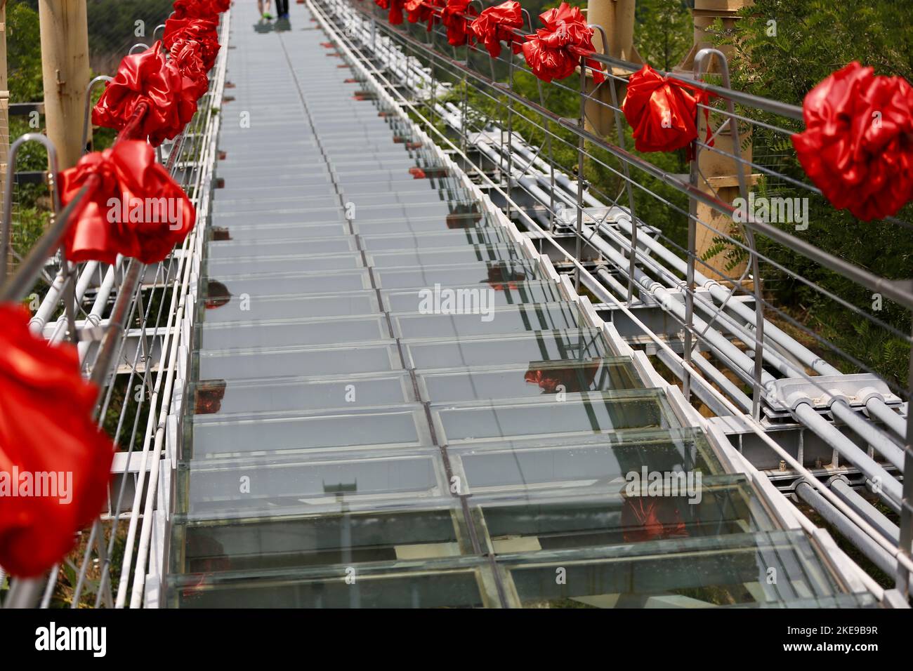 Aerial photos show the world's longest glass suspension bridge ...