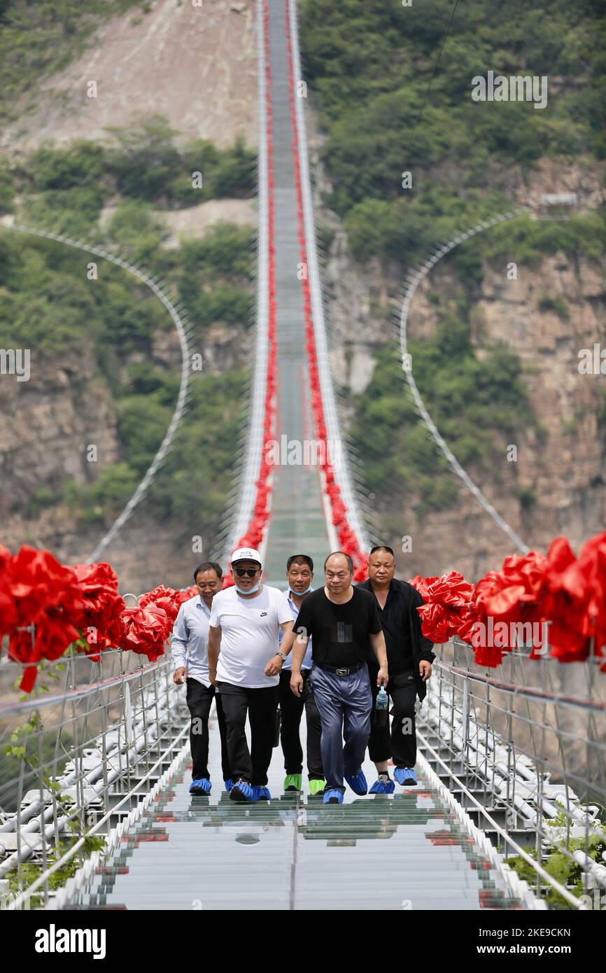 Aerial photos show the world's longest glass suspension bridge ...
