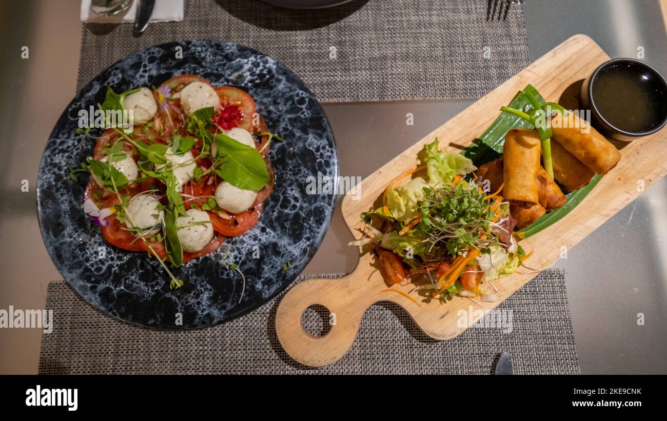 Thai spring rolls, Top view at a table with Thai food Stock Photo - Alamy