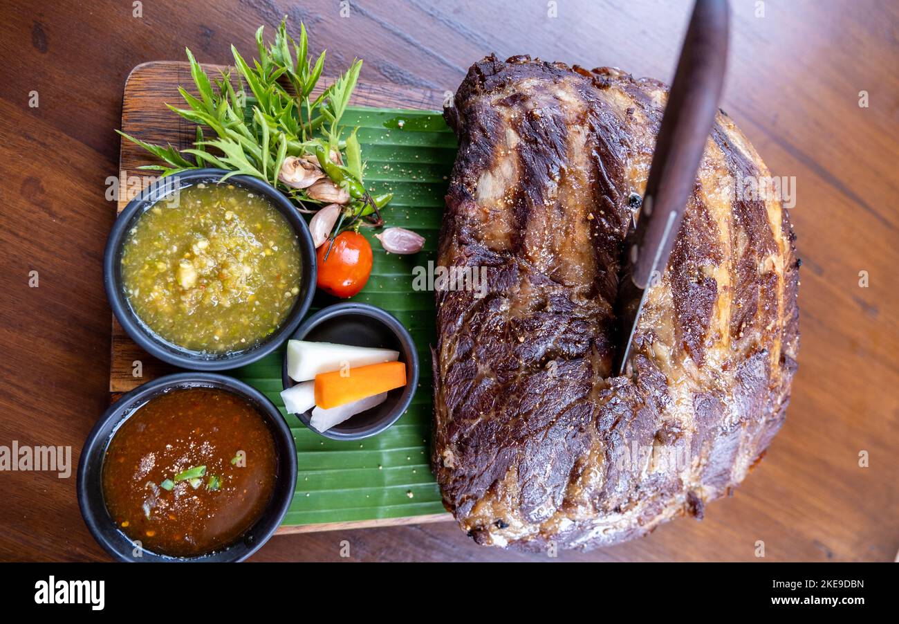 Slow Cooked Pork Ribs on a table in a restaurant Stock Photo - Alamy