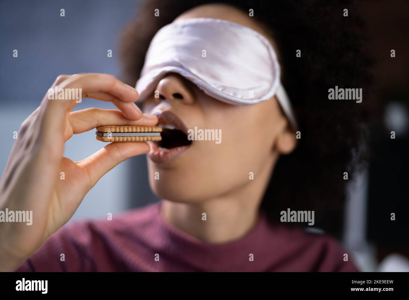 Portrait Of Blindfolded Young Woman Testing Food Stock Photo - Alamy