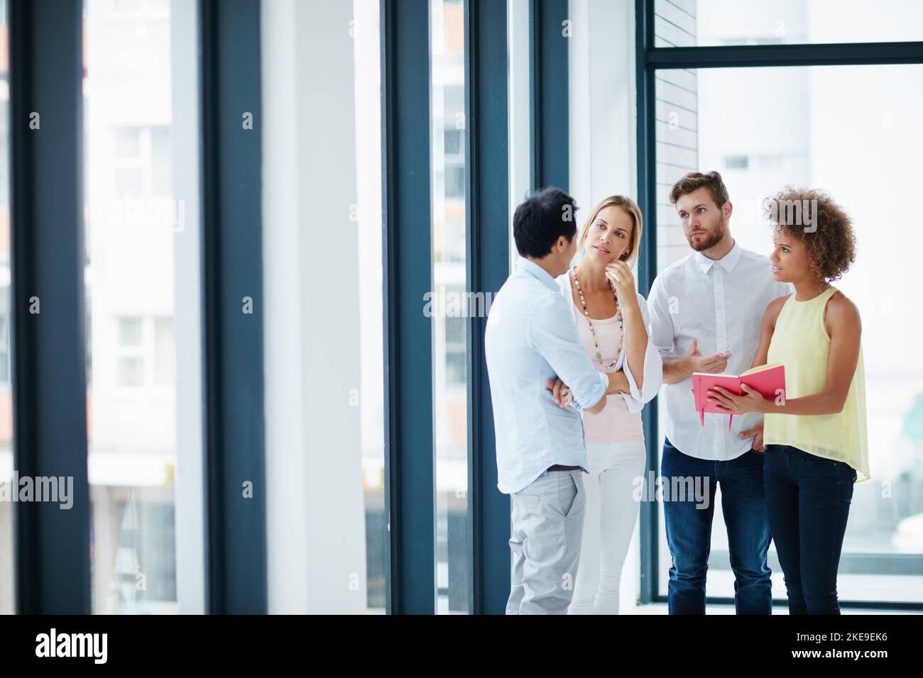 Together, everyone achieves more. a group of colleagues having a ...