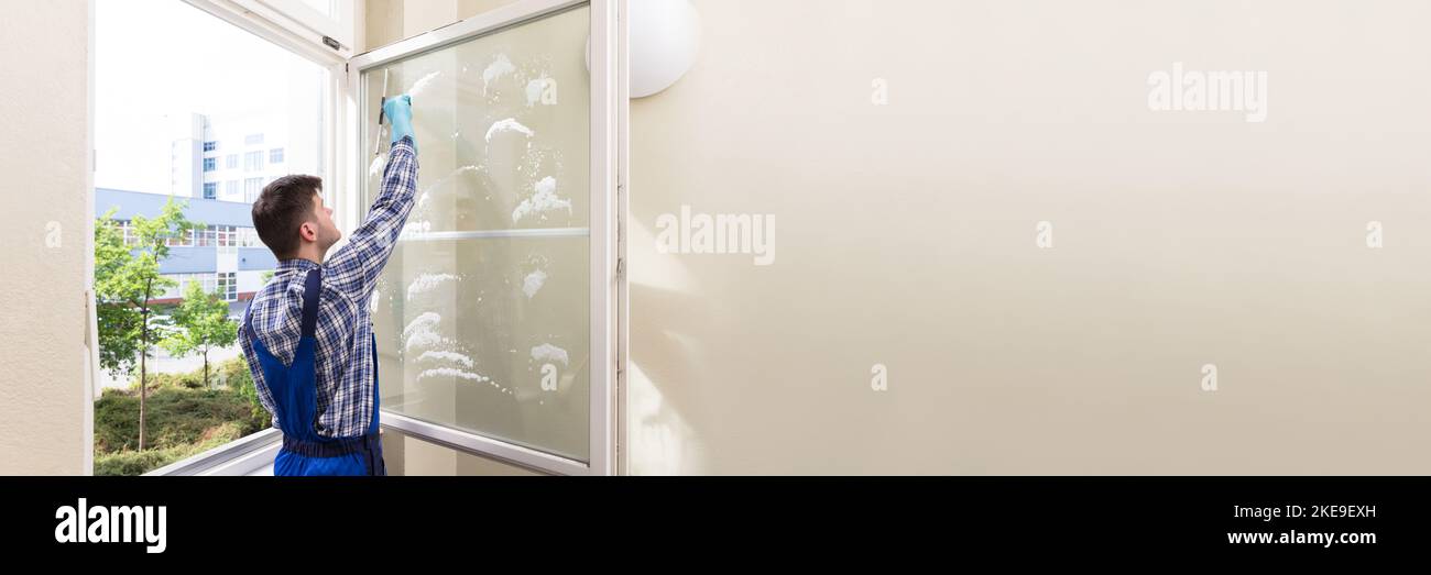 Office Window Cleaning Service. Professional Male Cleaner Stock Photo ...