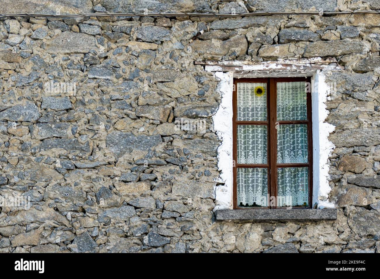 A small window of an old stony house Stock Photo - Alamy