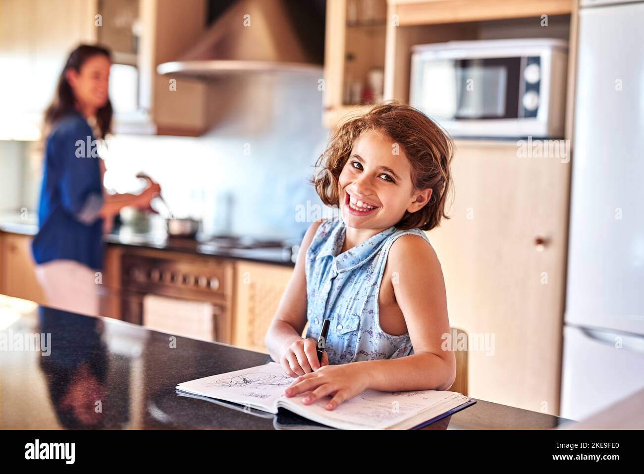 Little girl writing love mom hi-res stock photography and images - Alamy