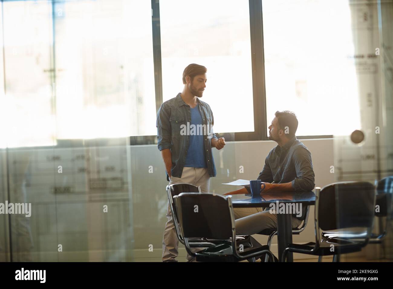 Two men talking work hi-res stock photography and images - Alamy
