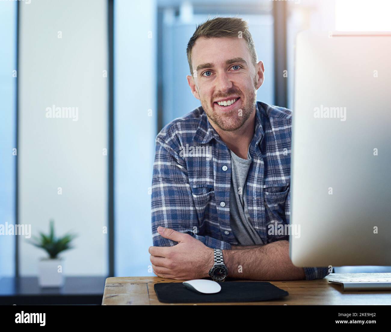 The face of entrepreneurial success. Portrait of a happy young ...