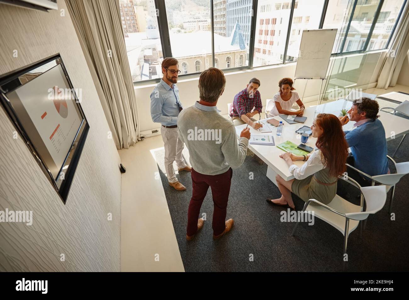 Theyve got important updates to address. two businessmen giving a ...