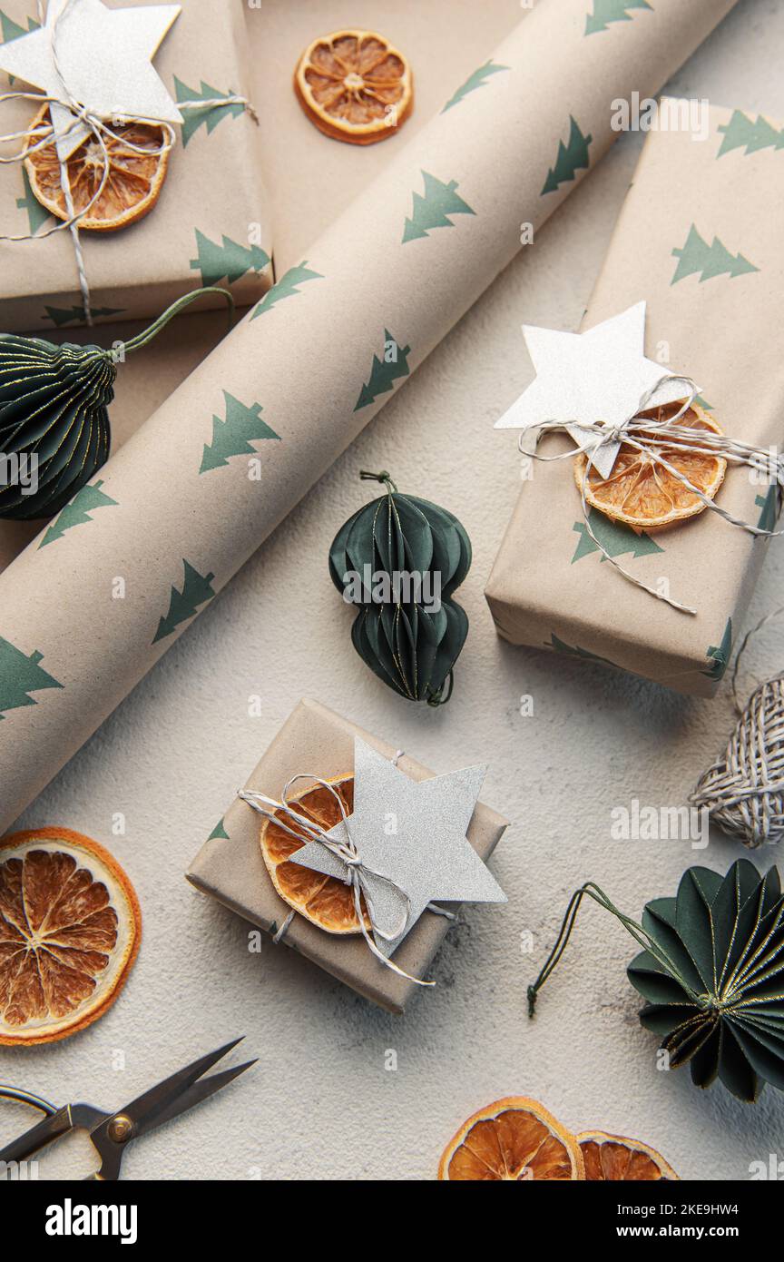 Christmas gift boxes, clews of rope, paper's rools and decorations ...