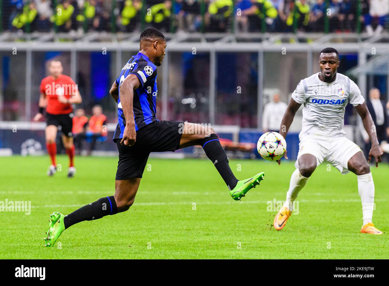 Milan, Italy - October 26: Denzel Dumfries of Internazionale (L) controls the ball during the ...