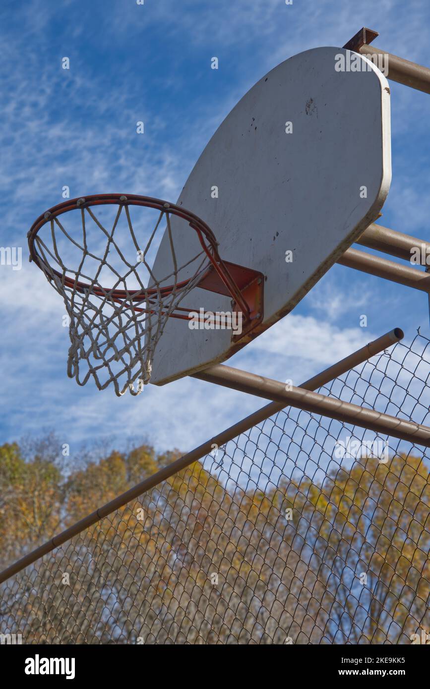 Basketball hoop against blue sky with clouds Stock Photo - Alamy