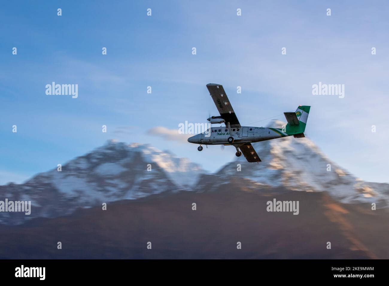 Flying around mountain peak hi-res stock photography and images - Alamy
