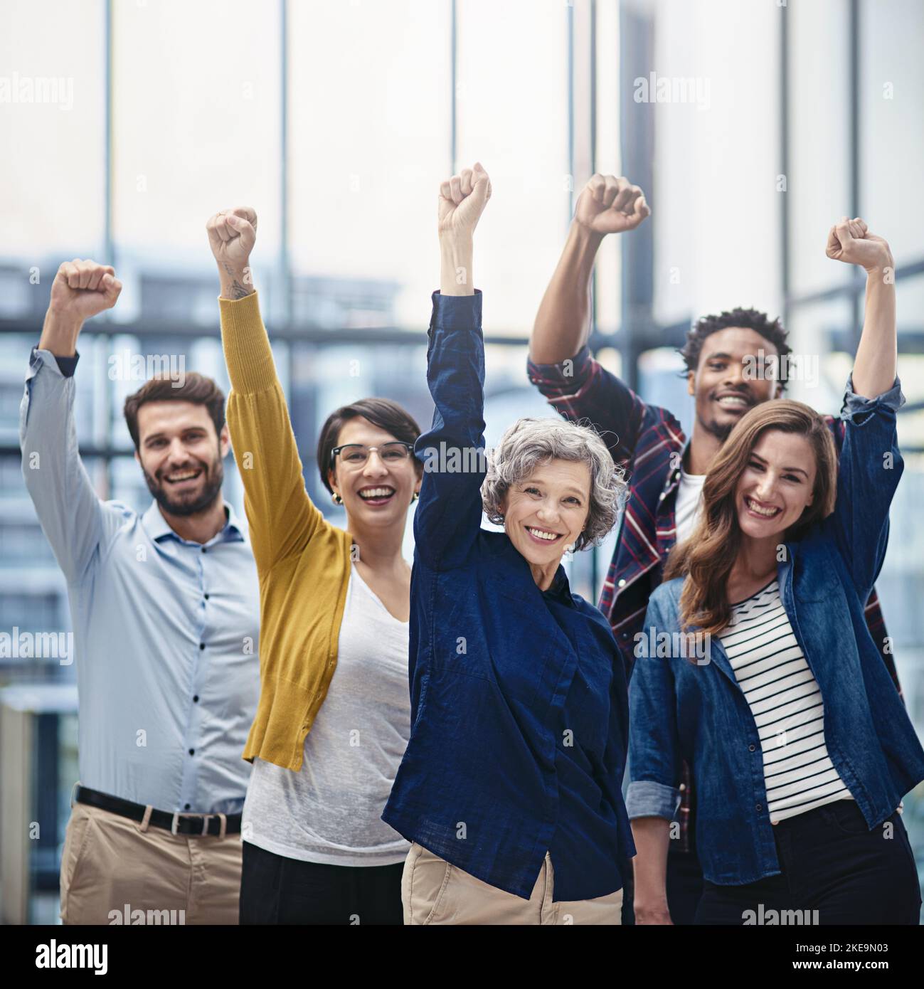 Success needs to be celebrated. Cropped portrait of a group of ...