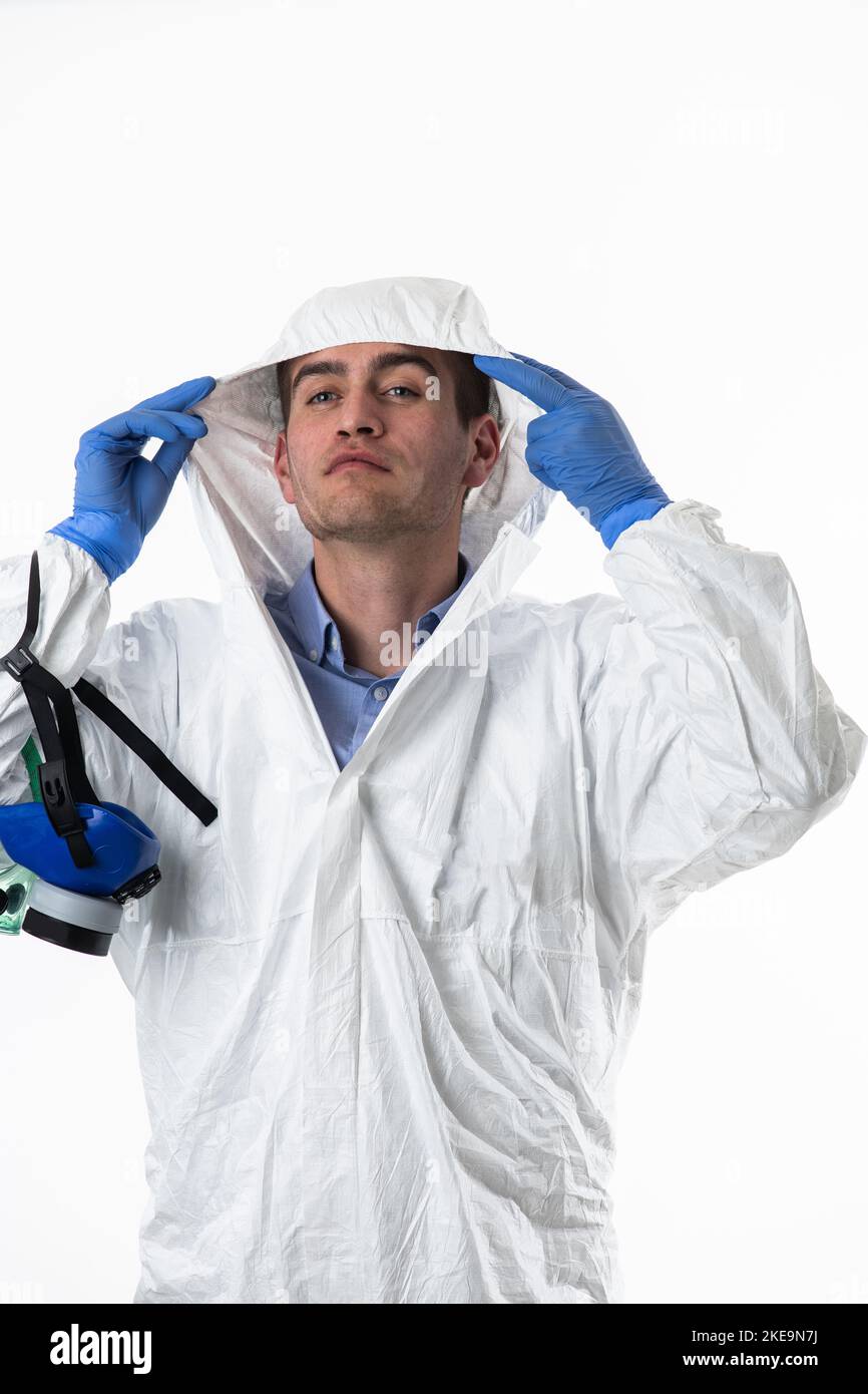 Doctor wearing protective biological suit and mask due to coronavirus ...