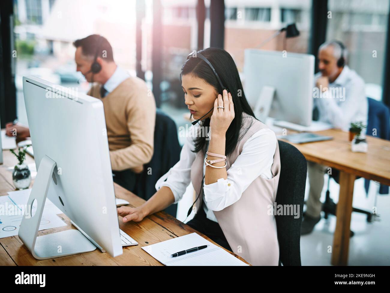 Whats your problem. an attractive young female operator working at her ...