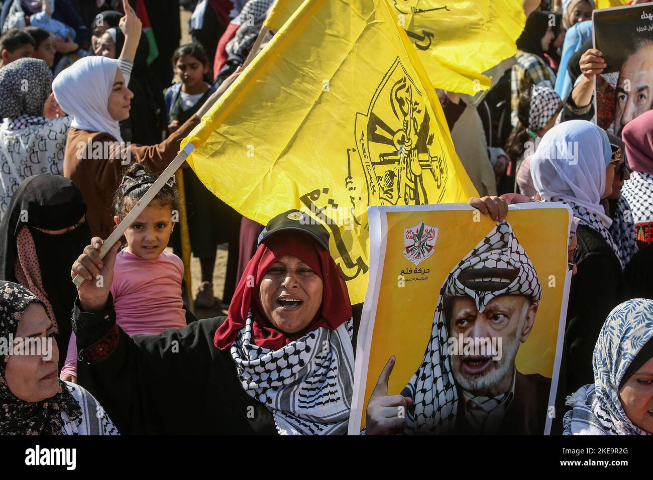 Palestinians take part in a Fatah rally marking the 18th anniversary of ...