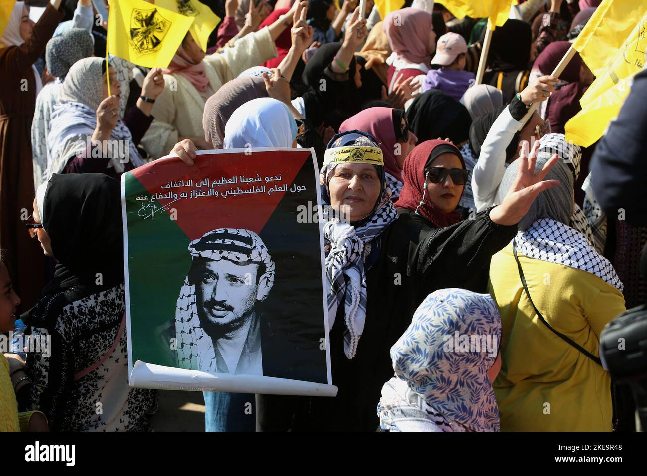 Palestinians take part in a Fatah rally marking the 18th anniversary of ...