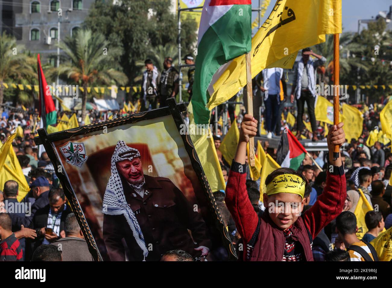 Palestinians take part in a Fatah rally marking the 18th anniversary of ...