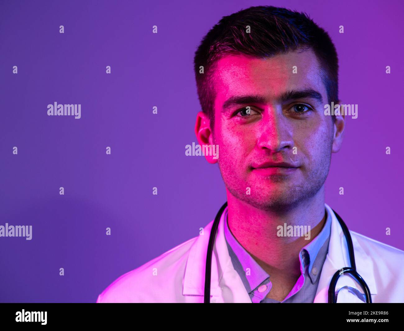 Coronavirus covid-19 danger alert Portrait of hero in white coat ...