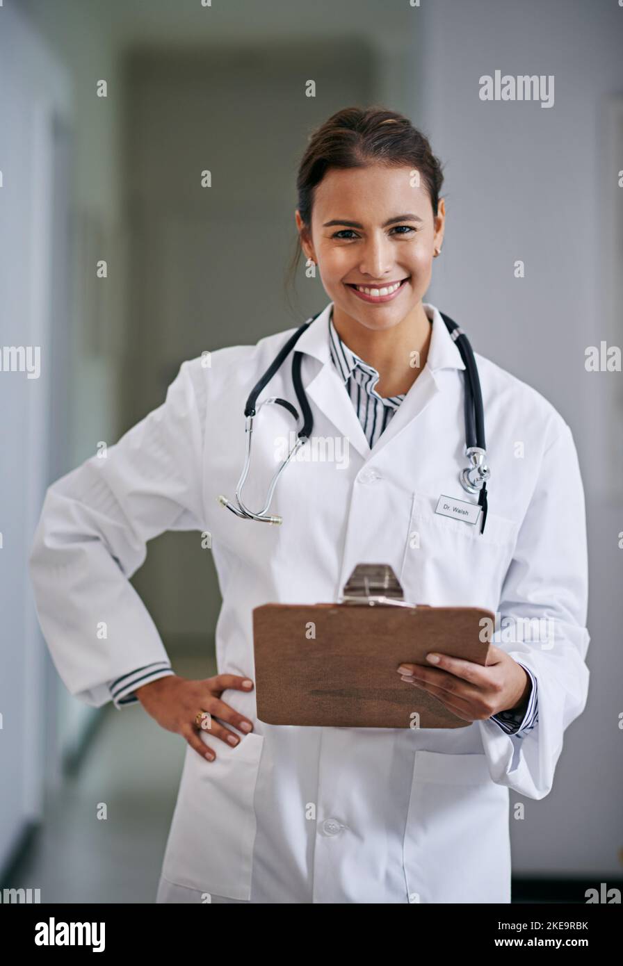 Your health is top priority. Portrait of a confident young doctor ...