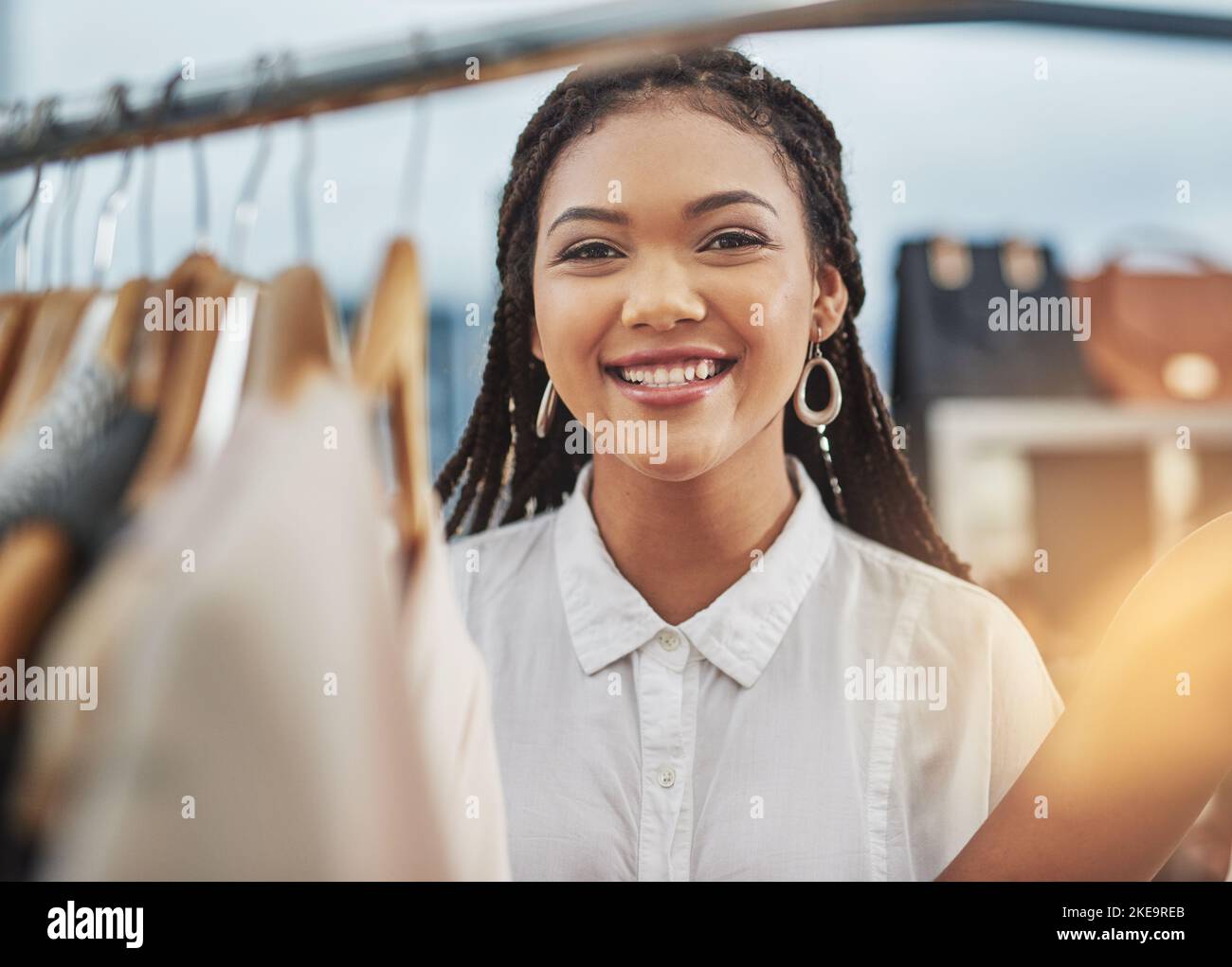 Shes always loved playing shop. Cropped portrait of a woman looking at ...