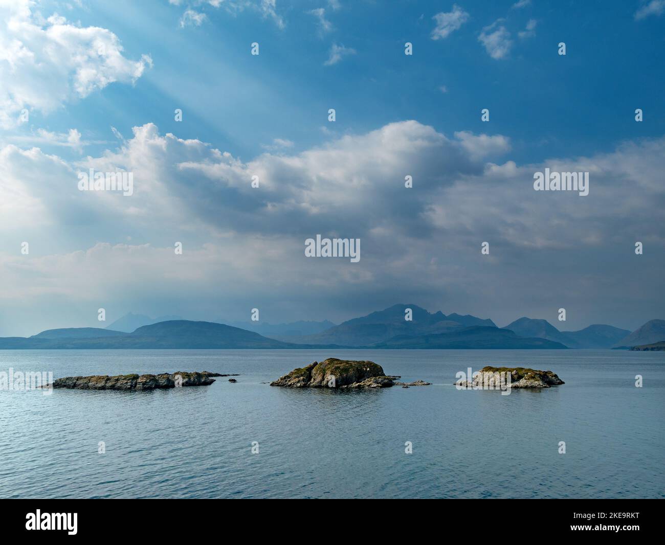 The tiny islands of Eilean Ruairidh in Loch Eishort with the Black ...