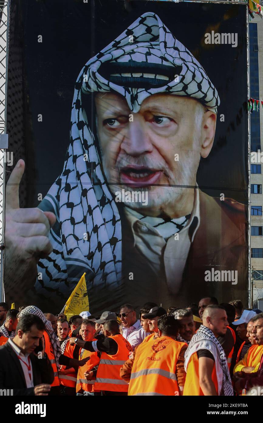 Palestinians take part in a Fatah rally marking the 18th anniversary of ...