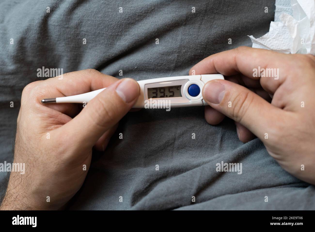 Digital thermometer indicating very high fever Stock Photo - Alamy