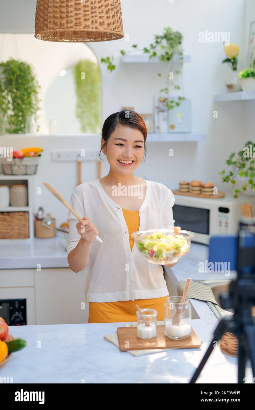 Food blogger recording video tutorial at home Stock Photo - Alamy