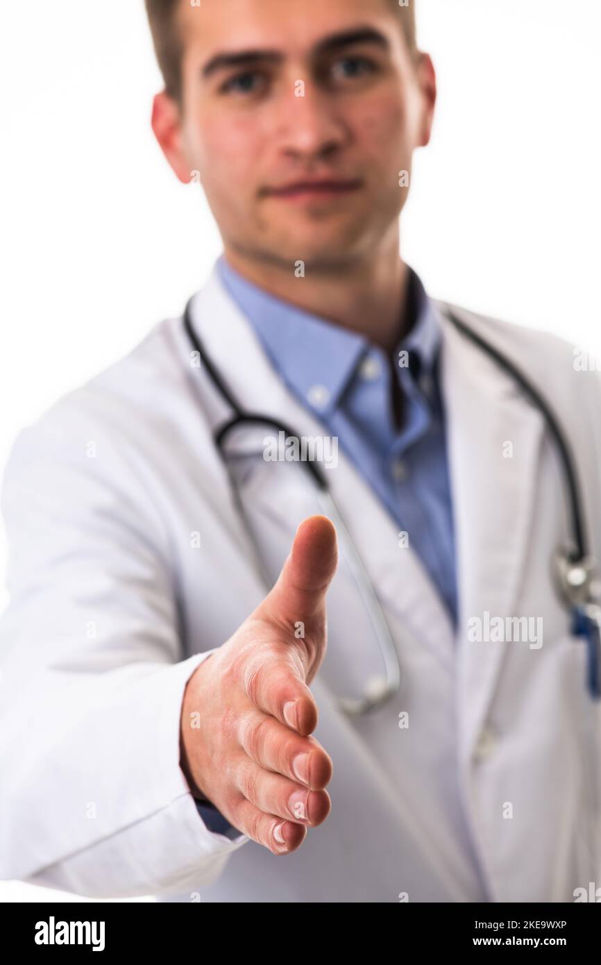 Portrait of a doctor holding out his hand as a support to a patient ...