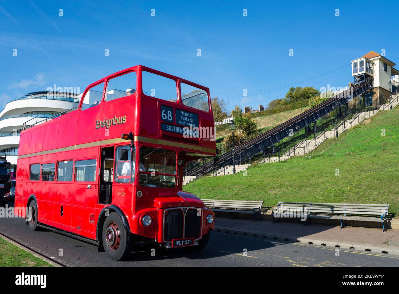 Vintage open top Routemaster bus running seafront service, passing the ...