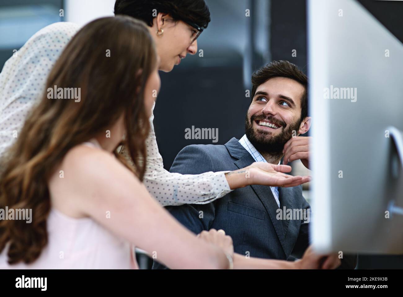 Working efficiently with technology at their side. businesspeople ...