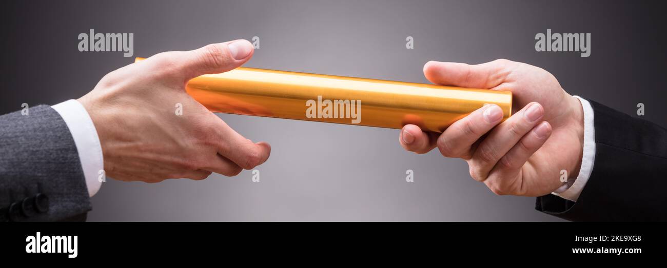 Relay Baton Pass And Handover. Job Race Passing Stock Photo - Alamy