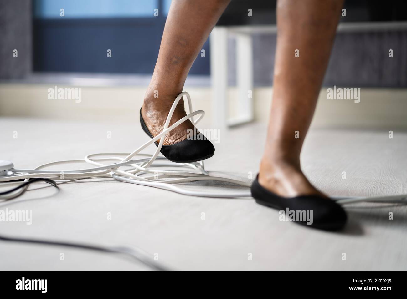 Stumble And Fall Over Wire In Office Stock Photo - Alamy