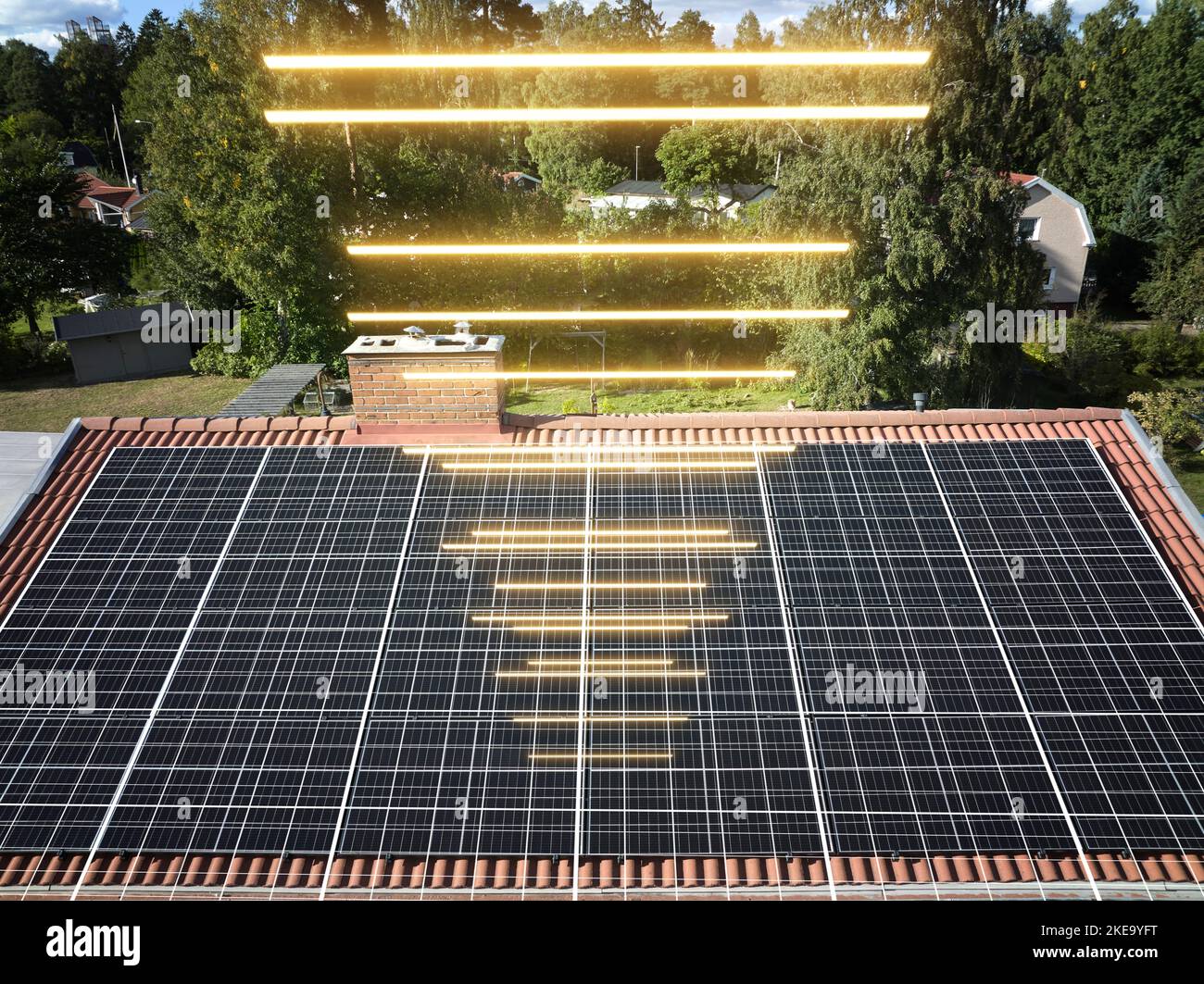 View of roof with solar panels Stock Photo - Alamy