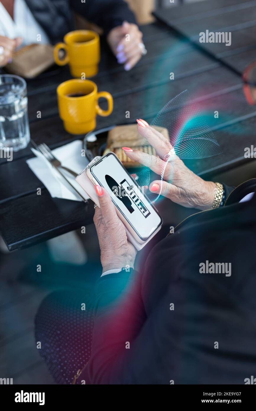 Woman reading fake news on cell phone Stock Photo - Alamy
